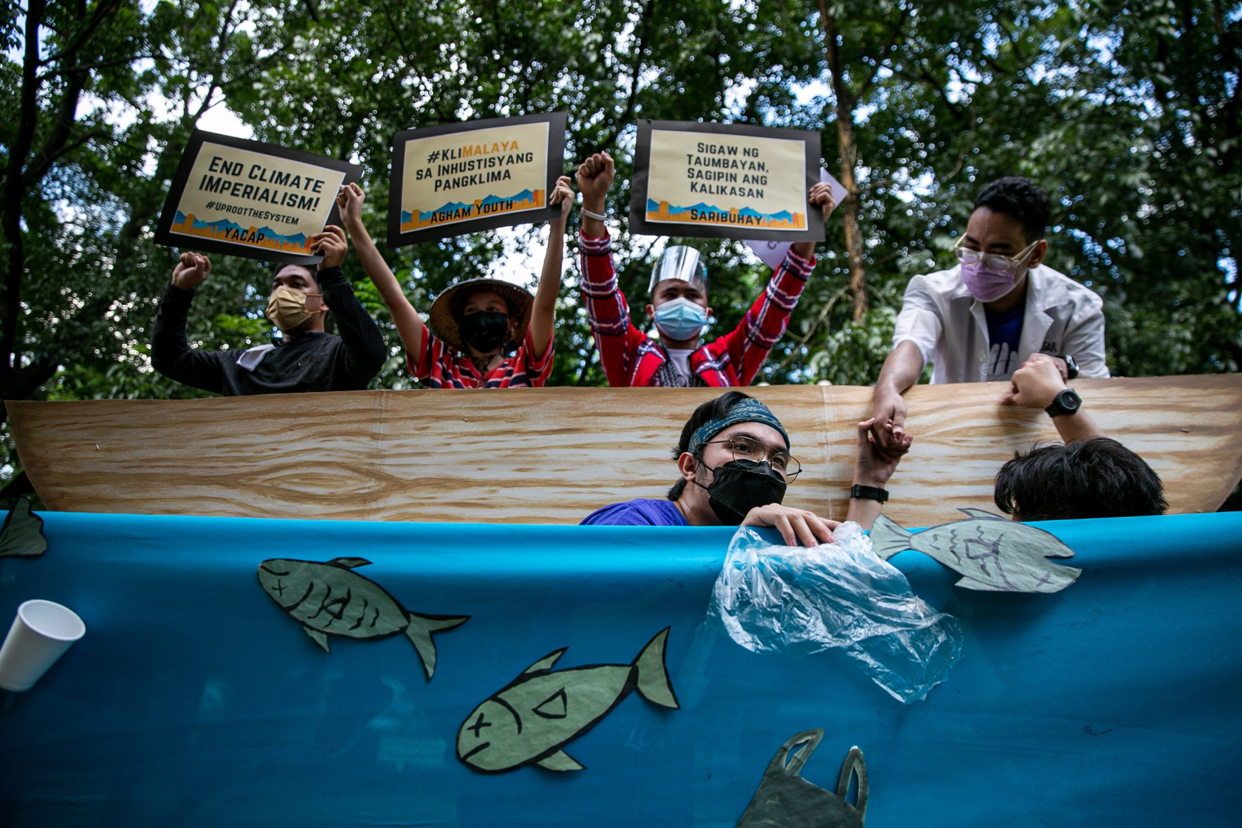 IN PHOTOS: Filipino climate activists in Manila and Glasgow march to ...